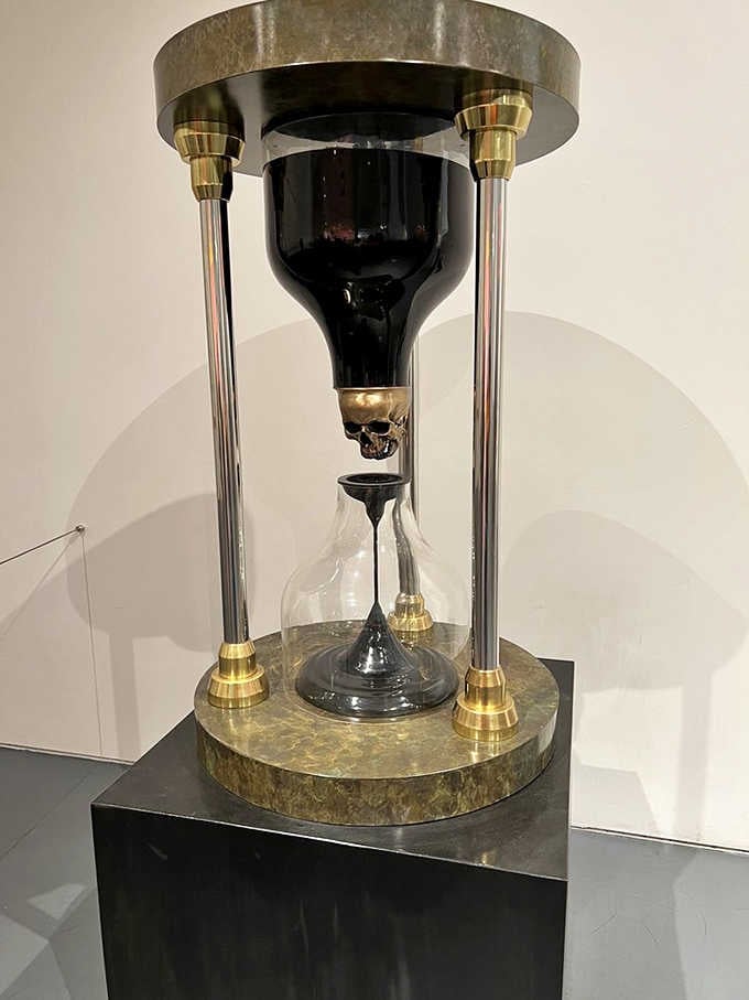 Time literally drips away in this mesmerizing hourglass sculpture that makes waiting feel almost philosophical.
