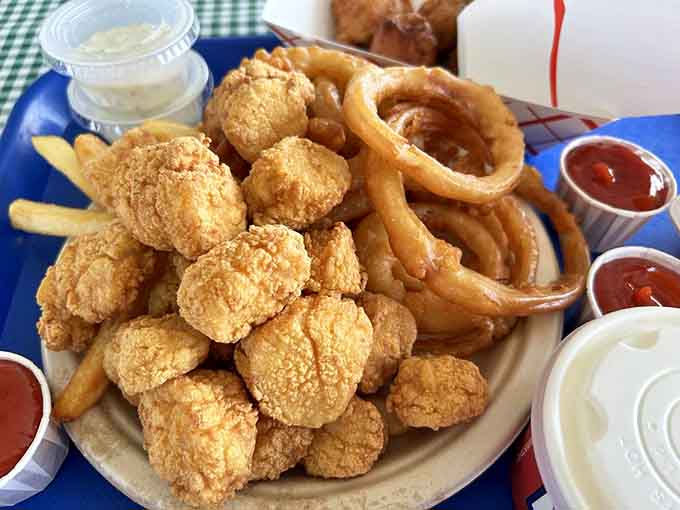 Golden scallops fried to perfection, because the ocean's candy deserves the royal treatment it gets here.