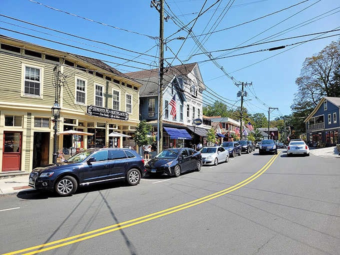 Colorful storefronts march up the hill like a rainbow decided to open a shopping district.