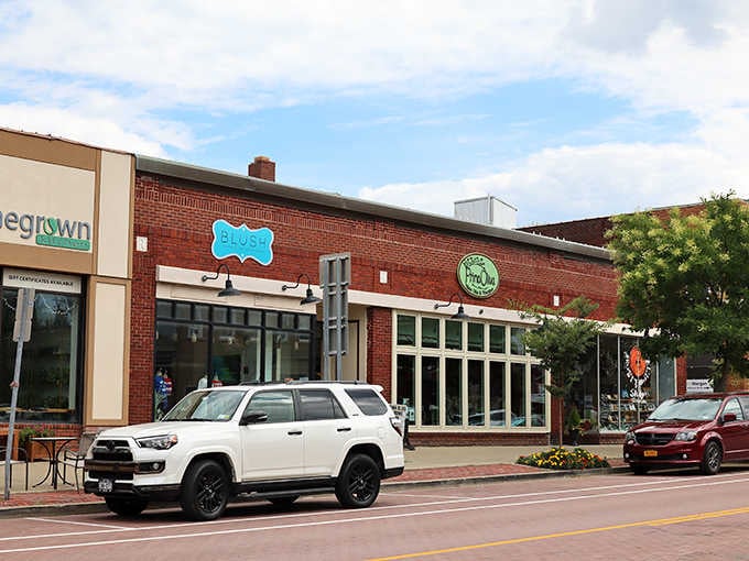 Modern shops nestle into brick buildings proving old and new can dance together quite beautifully indeed.