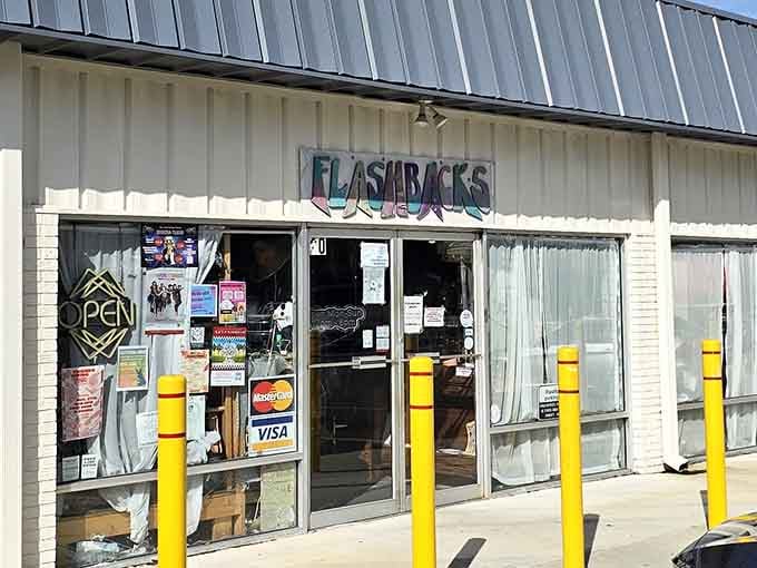 The retro signage and yellow safety posts give this spot authentic vintage vibes before you even step inside.