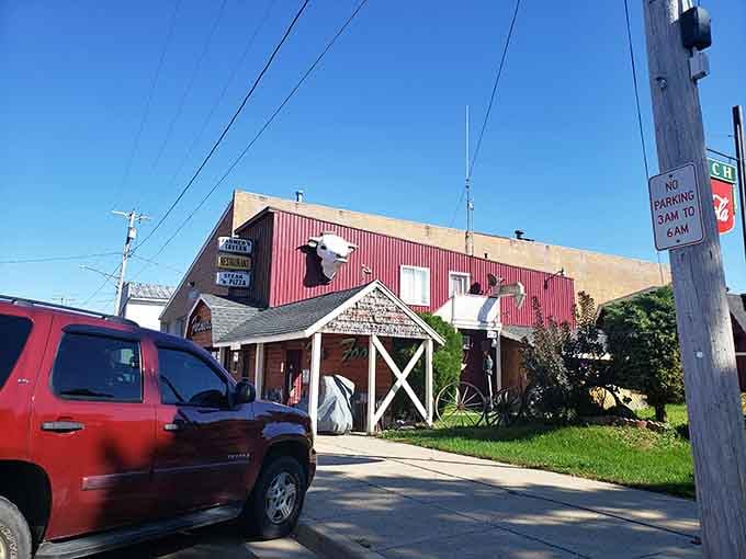 The rustic wooden entrance and farm-style architecture celebrate Michigan's agricultural heritage with playful, welcoming charm that makes everyone smile.