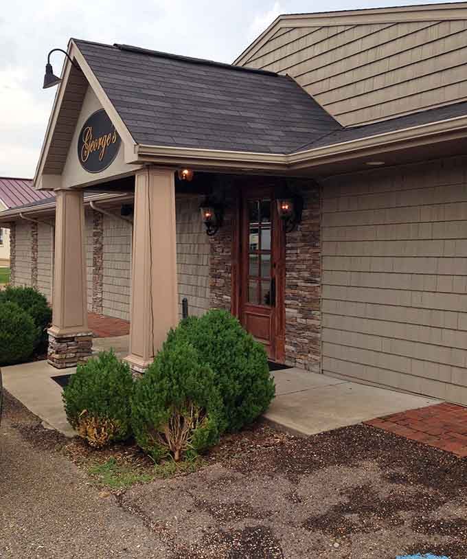 That charming peaked entrance with stone accents welcomes you like an old friend bearing gifts of delicious dinner.