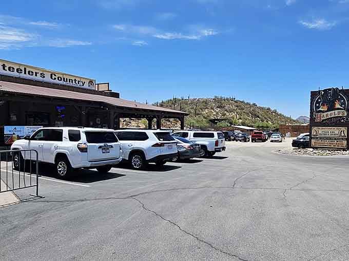 Desert mountains frame this authentic corral where mesquite smoke and cowboy hospitality create unforgettable dining adventures.