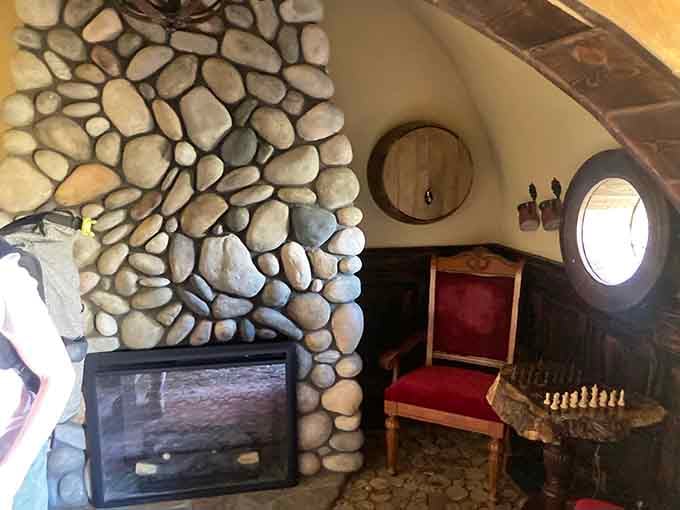 That river rock fireplace isn't just beautiful, it's the kind of craftsmanship that makes you stop and stare.