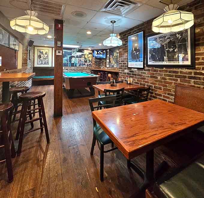 Exposed brick walls and pool tables create that authentic pub atmosphere where everyone feels like a regular.
