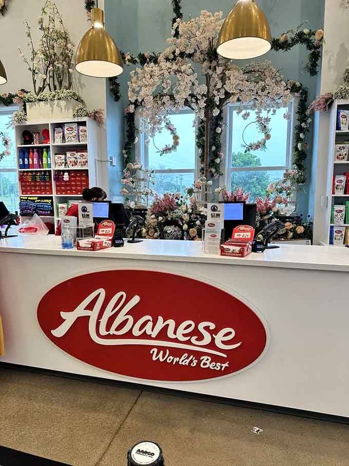 The checkout counter blooms with floral decorations, making even paying for your sugar haul feel like celebration.