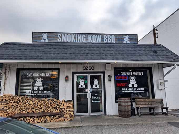 Smoking Kow BBQ stacks its wood like edible architecture, promising slow-smoked goodness that makes vegetarians question their life choices temporarily.
