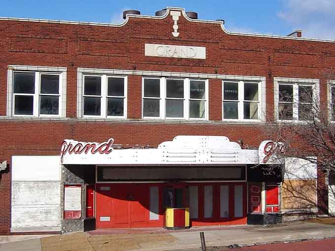 The Grand Theatre's vintage marquee reminds you that entertainment existed before streaming services monopolized our evenings.