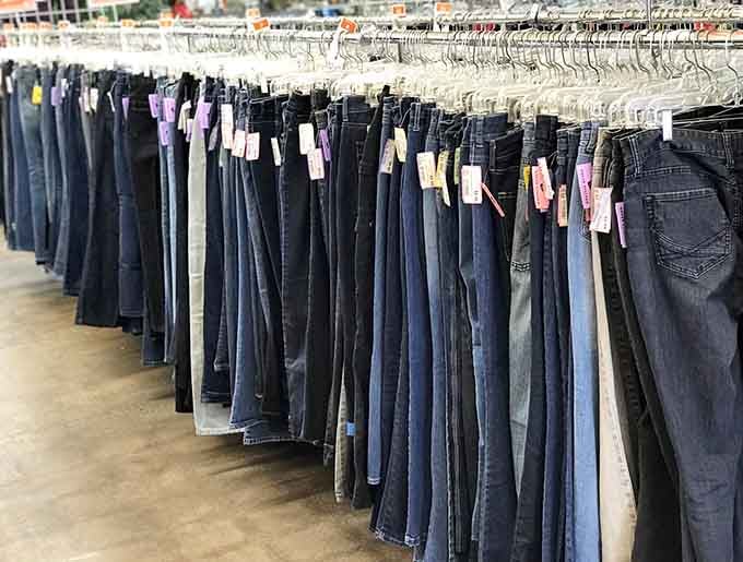 A denim wall of dreams where finding the perfect pair of jeans becomes an achievable quest.