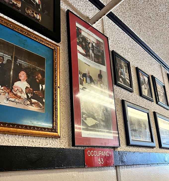 These walls tell stories of famous visitors who knew great barbecue doesn't need fancy zip codes or valet parking.