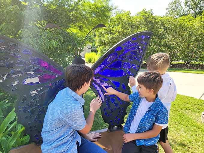 When visitors stop to admire a butterfly sculpture, you know the garden's doing something wonderfully right for all ages.