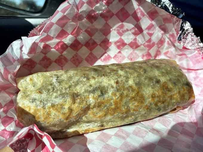 This carne asada burrito is wrapped tighter than a present and just as exciting to unwrap.