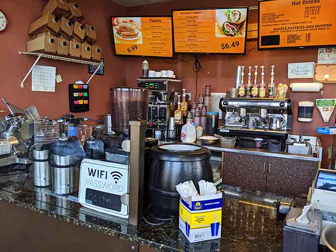 The coffee station setup shows they take their beverages as seriously as their bagels, from simple drip to specialty drinks.