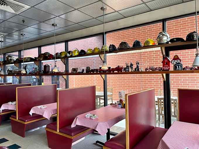Firefighter helmets line the shelves like trophies, each one representing heroes who've answered the call to serve.