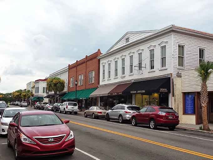 Bay Street's historic buildings stand shoulder to shoulder, each facade telling its own story through architectural details and weathered charm.