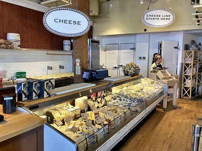 The cheese counter displays their handcrafted varieties like edible jewels, each one waiting to be discovered and devoured.