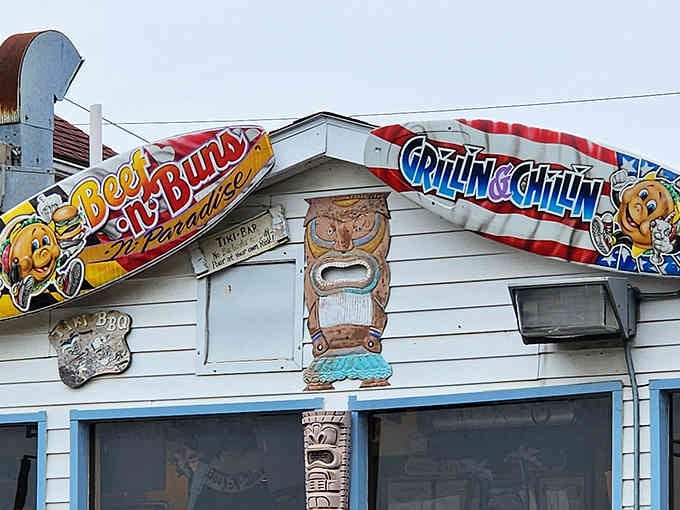 The tiki totem and patriotic surfboard combo is more American summer than apple pie and fireworks combined.