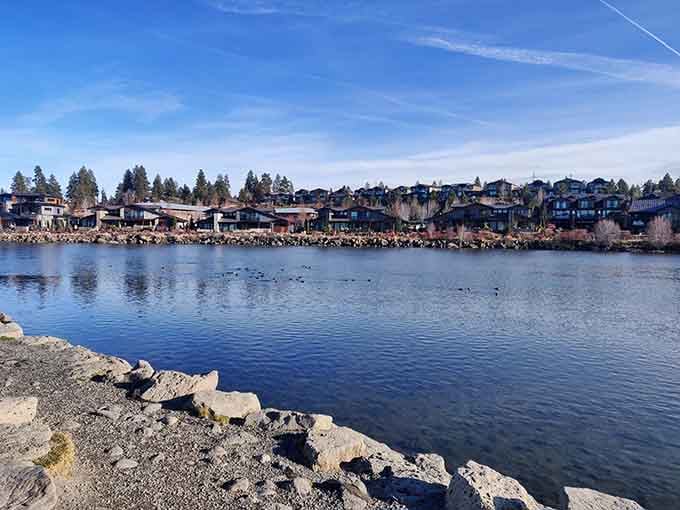 Lakeside living with mountain views, where the real estate photos somehow undersell what you're actually getting here.
