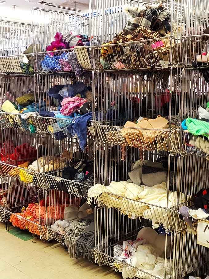 Scarves and accessories tumbling from wire baskets like a textile waterfall of infinite fashion possibilities and colors.