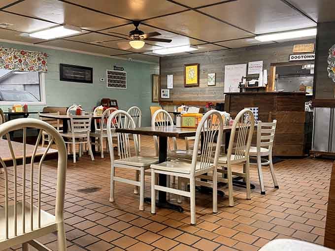 Simple seating, floral curtains, and the promise of leaving fuller than you ever thought humanly possible.