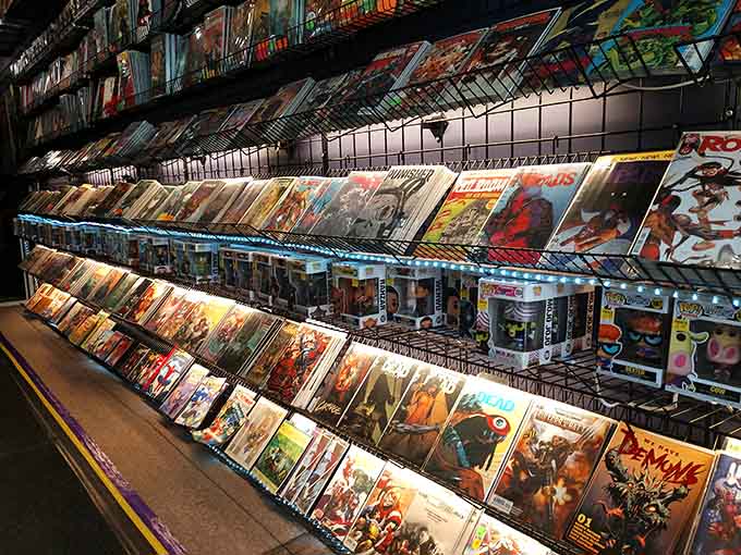 Wall-to-wall comics organized with care show this isn't just decoration, it's a genuine passion project come alive.