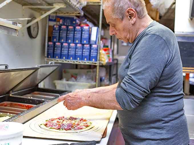 Watching pizza being made is like dinner theater, except the performance is edible and the reviews are always glowing.