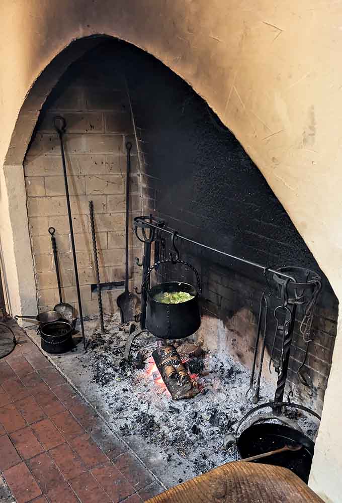 An actual working hearth where your meal gets cooked over open flames—no microwaves in sight.
