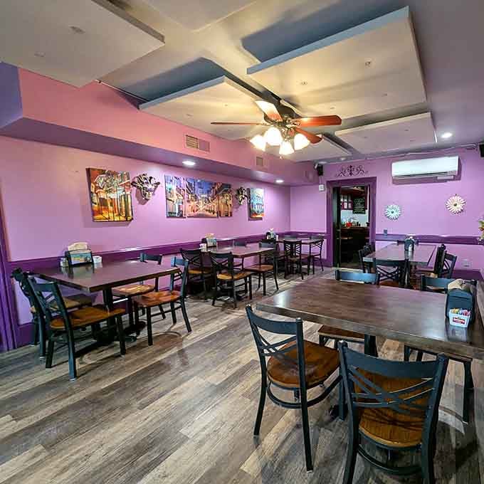 Spacious dining room with artwork celebrating New Orleans, because good food deserves an equally vibrant setting to match.