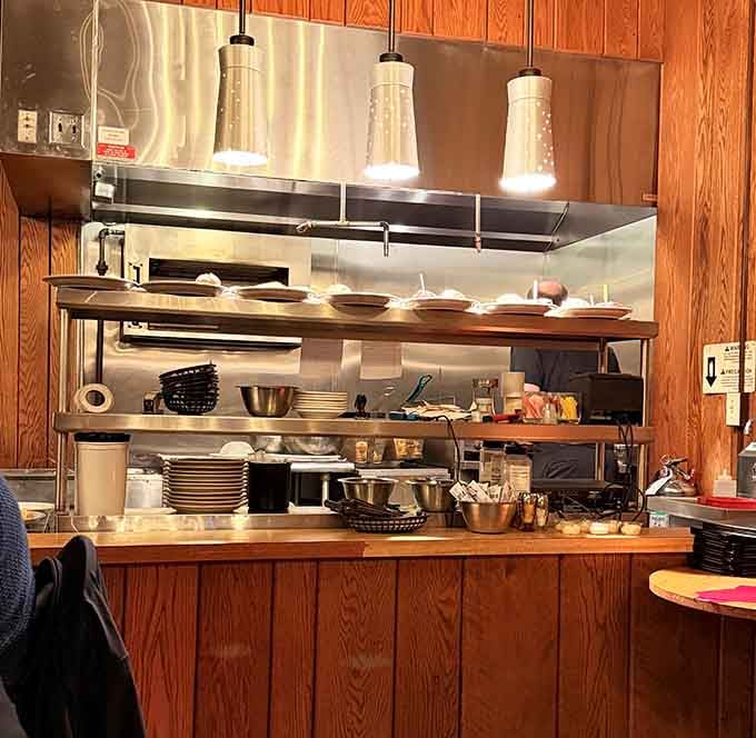 The open kitchen lets you watch the magic happen, which builds anticipation wonderfully or dangerously.