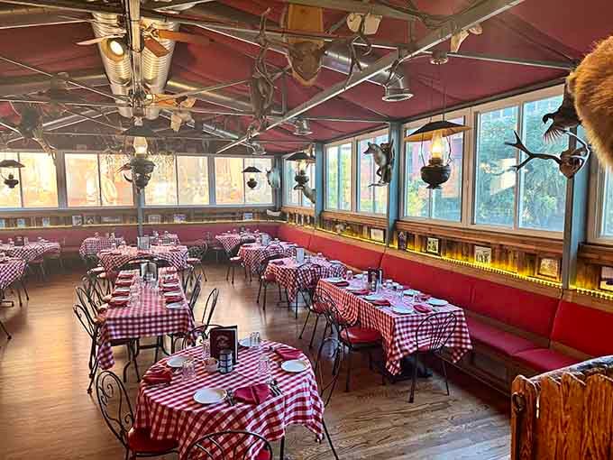 This dining room with its pressed tin ceiling and mounted wildlife creates an atmosphere money simply cannot replicate today.