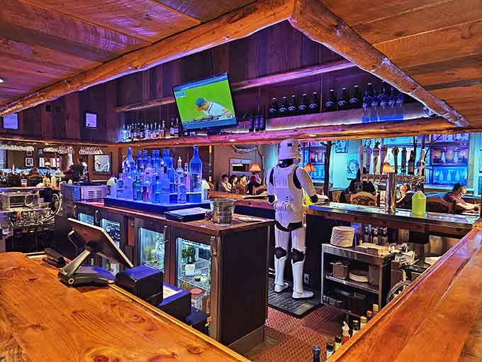 The bar glows with purple lighting and possibility, perfect for unwinding after a day of Dells adventures.