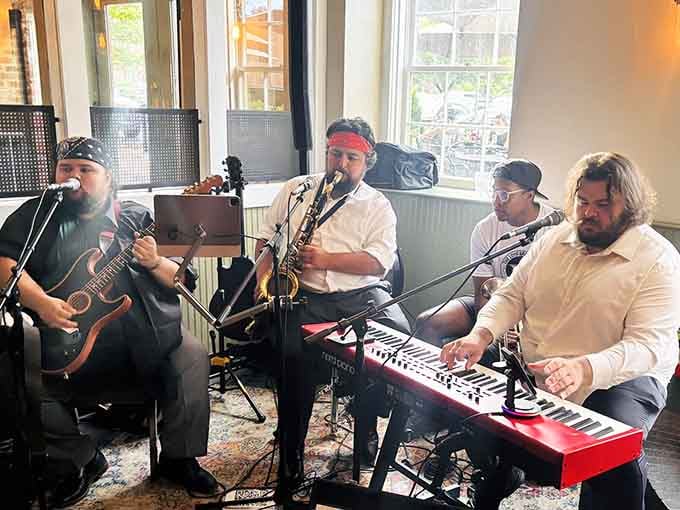 Live music transforms dinner into an event, proving that entertainment and pizza make excellent companions for any evening.