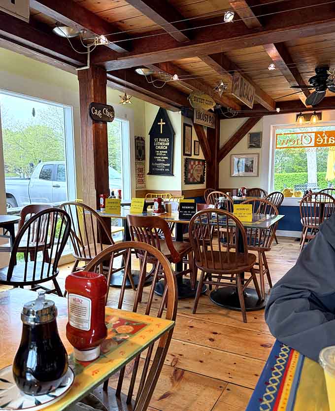 Wood-paneled walls covered with local art and vintage signs prove that eclectic decor works when the food backs up the atmosphere.