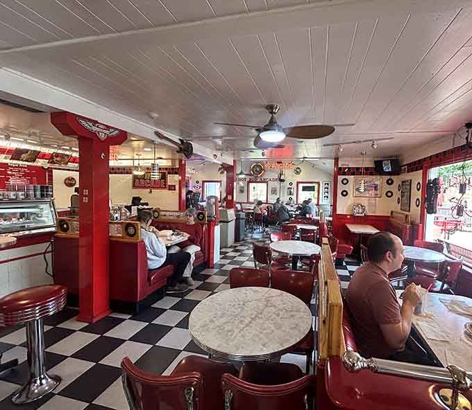 Chrome stools and vintage memorabilia create an atmosphere where you half expect Fonzie to slide into the next booth.