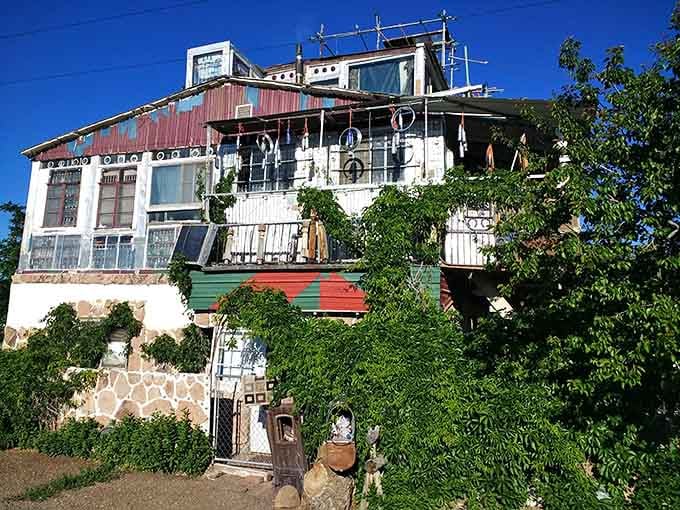 Nature reclaims what it can, but the castle stands firm, a collaboration between human creativity and wild growth.