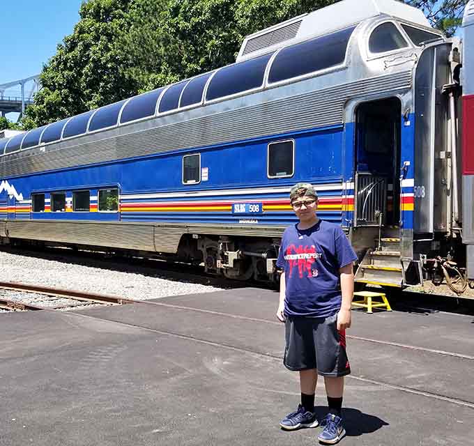 Young rail enthusiasts discovering the romance of train travel, one photo opportunity at a time.