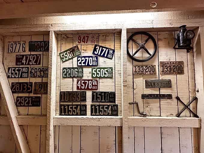 These weathered license plates tell stories of road trips past, each dent and scratch a memory frozen in metal.