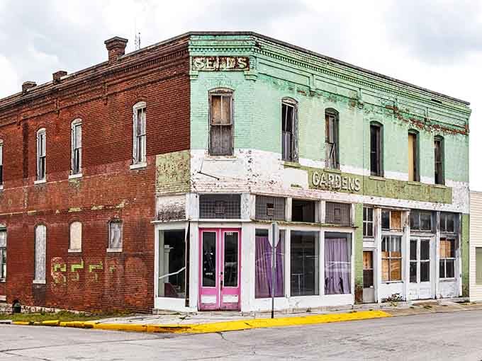 Weathered paint and faded signs tell stories of Carthage's commercial past on this characterful downtown corner building.