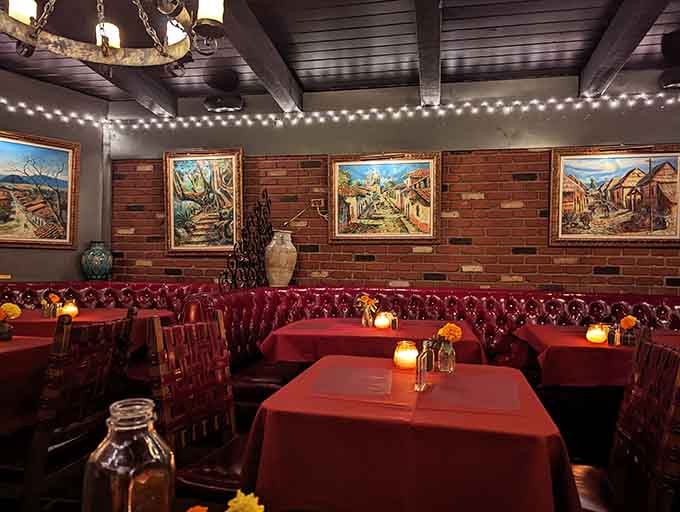 More red leather booths and desert paintings create cozy corners where conversations flow as smoothly as the margaritas.