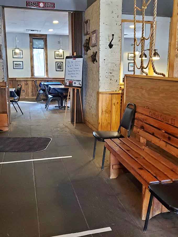 The waiting area features wooden benches and patriotic touches, where hungry diners happily anticipate their upcoming seafood feast.