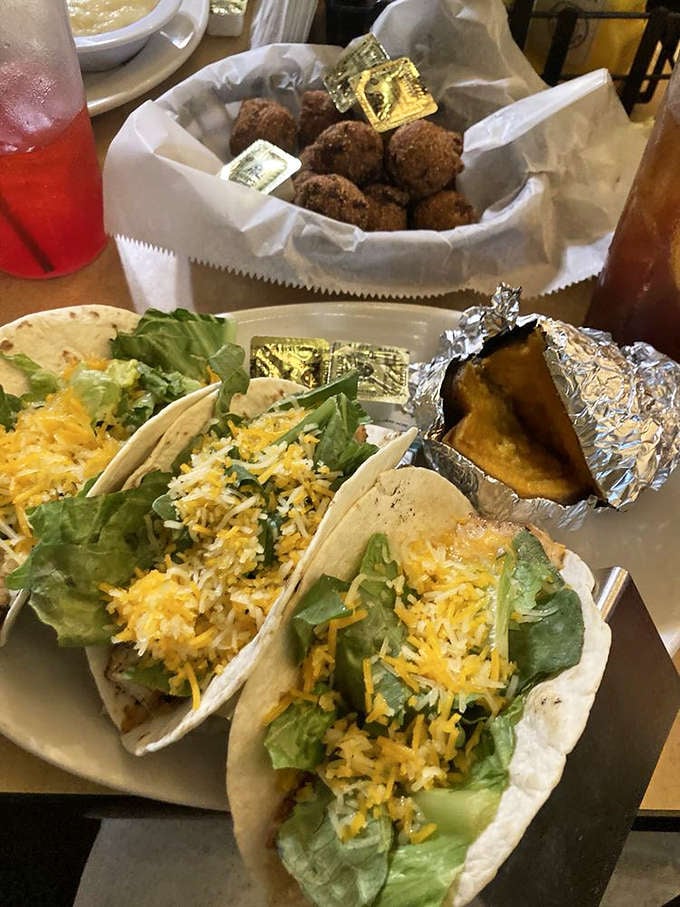 Fish tacos bring a lighter option to the table, though "lighter" is relative when you're eating unlimited rounds.