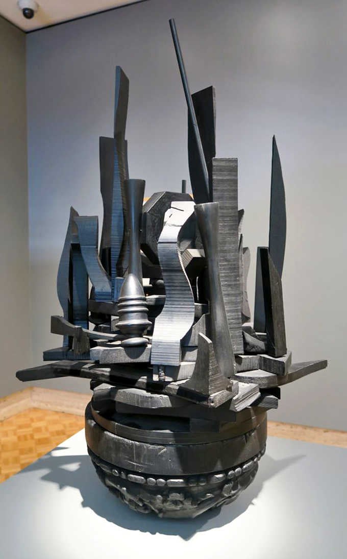 Abstract metal forms rise like a futuristic cityscape, all sharp angles and industrial beauty commanding attention.