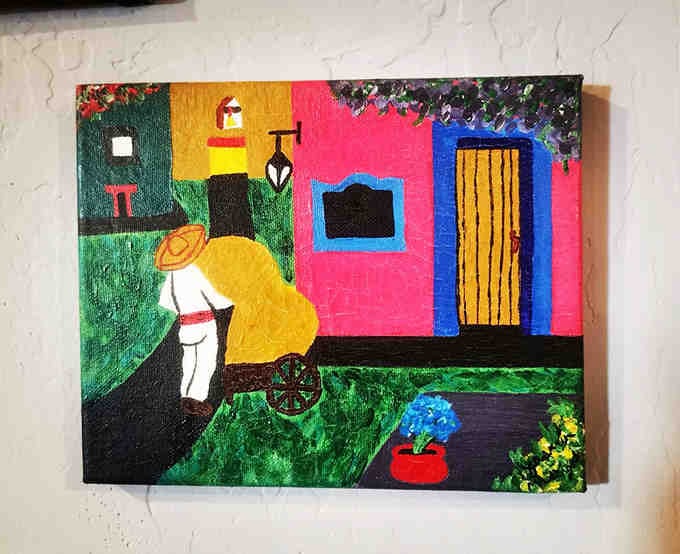 Colorful artwork adding personality to the walls without stealing the show from what's on your plate.