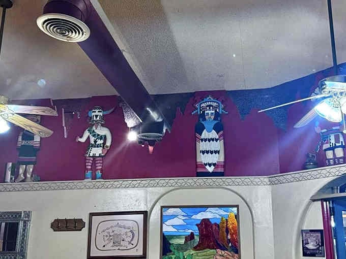 Kachina dolls watching over diners from above, adding authentic Southwest character to every bite you take down below.