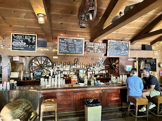 The bar where wagon wheels meet whiskey bottles, and bartenders pour drinks with the kind of generosity that built the West.