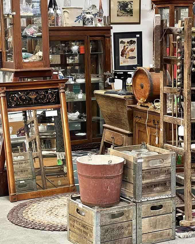 Weathered wood crates and antique treasures stack up like a perfectly composed still life from yesteryear.