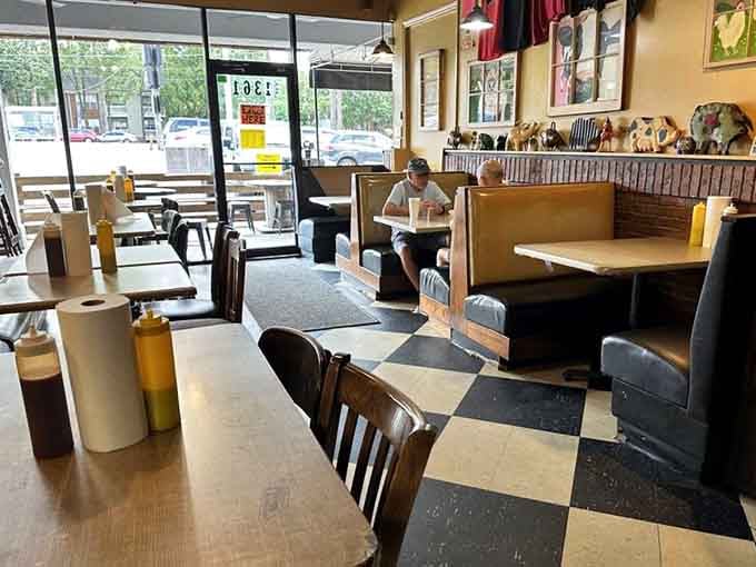 Booth seating positioned perfectly for watching other diners experience their first bite and immediately understand what the fuss is about.