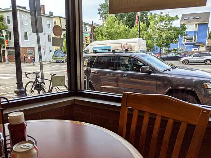 Corner booth with a view, perfect for contemplating life's mysteries between bites of clams.