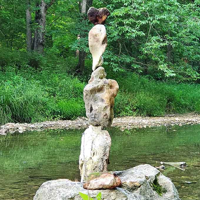 Someone's been practicing their rock-balancing zen by the water, creating art that won't last but somehow feels permanent anyway.